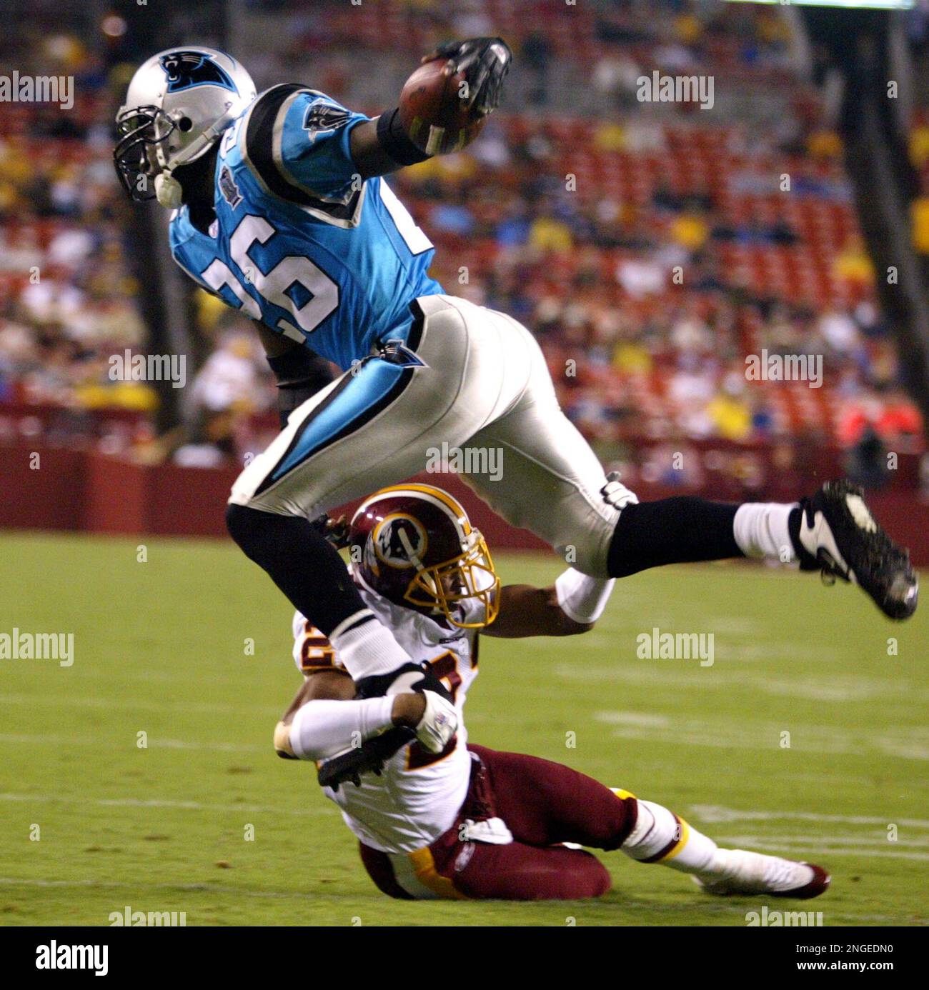 Washington Redskins cornerback Fred Smoot brings down Carolina Panthers ...