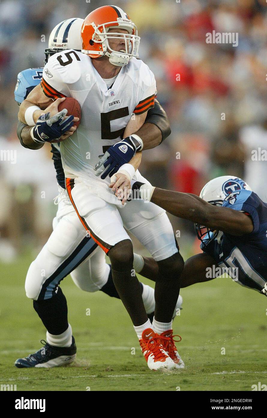 Cleveland Browns quarterback Jeff Garcia (5) gets taken down for a sack ...