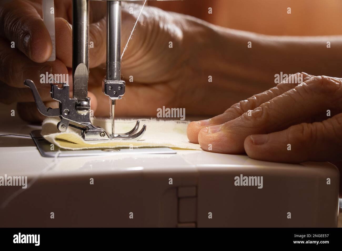 Woman stitch hi-res stock photography and images - Alamy
