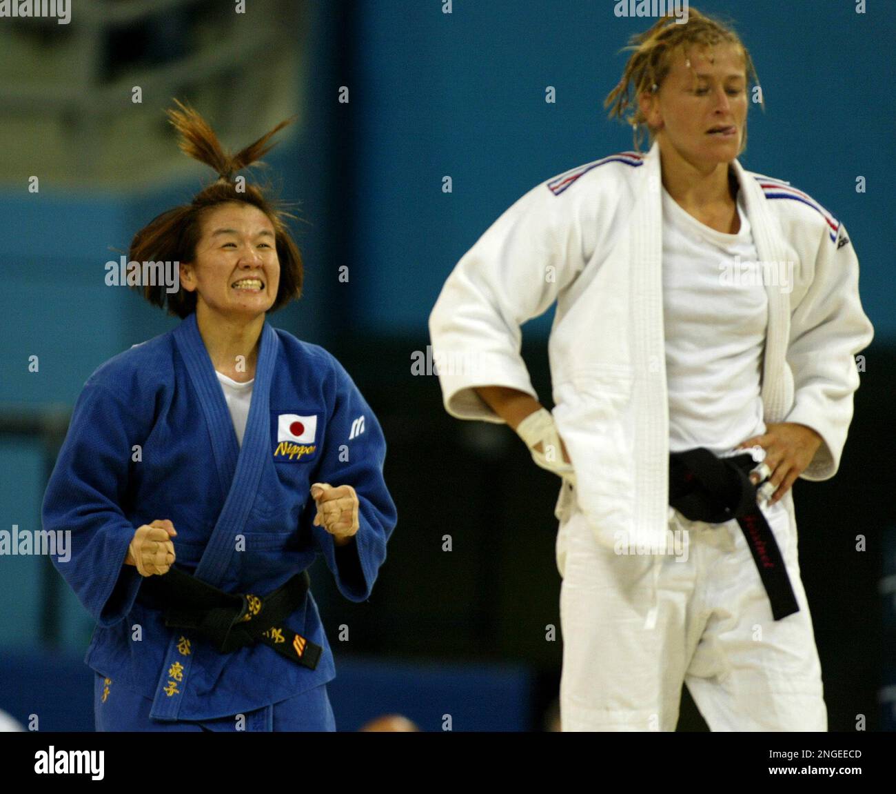 Japans Tani Ryoko Left Celebrates After Beating Frederic Jossinet