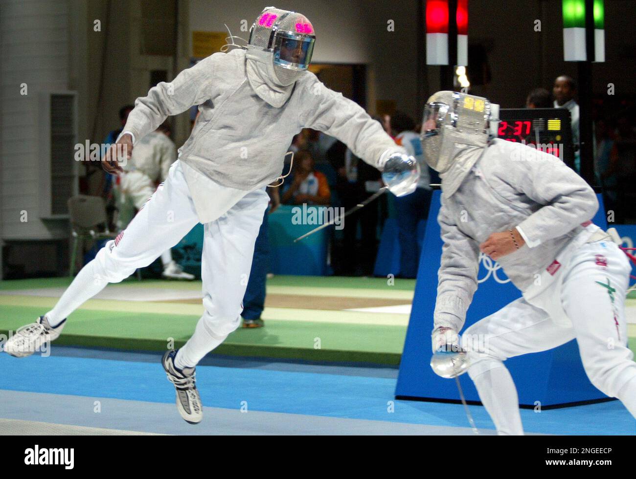 U.S. fencer Ivan Lee, left, during the Mens Individual Sabre Round of ...