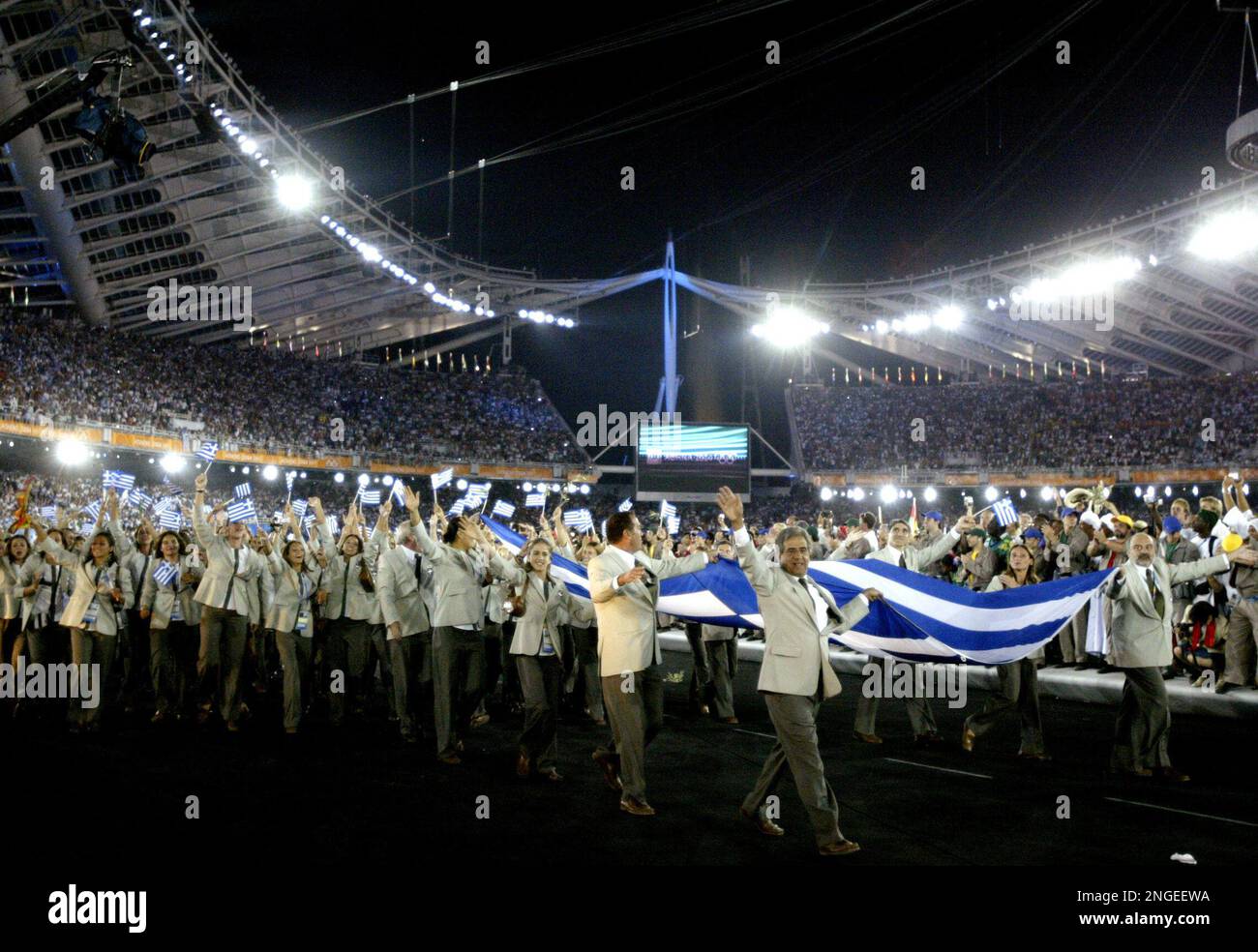 Greek athletes enter the stadium during the Opening Ceremony of the ...