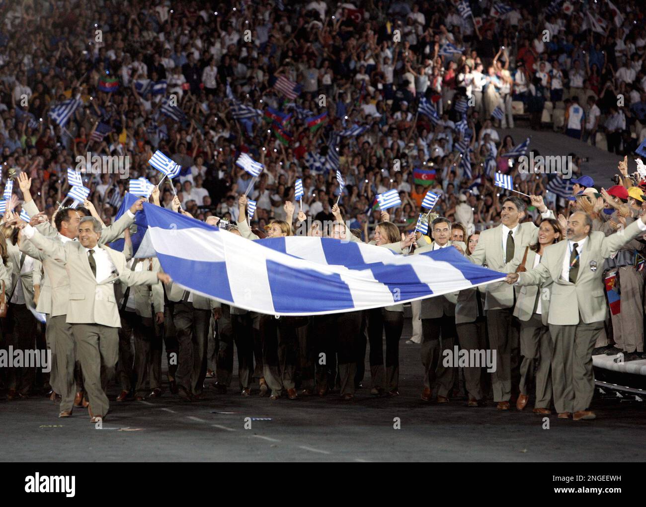 Greek athletes enter the stadium during the Opening Ceremony of the ...