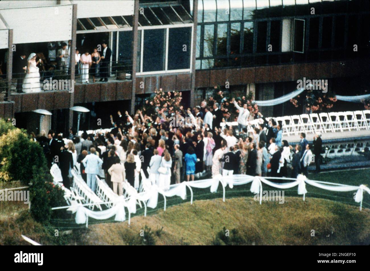 U.S. pop singer Madonna and U.S. actor Sean Penn, top left on balcony ...