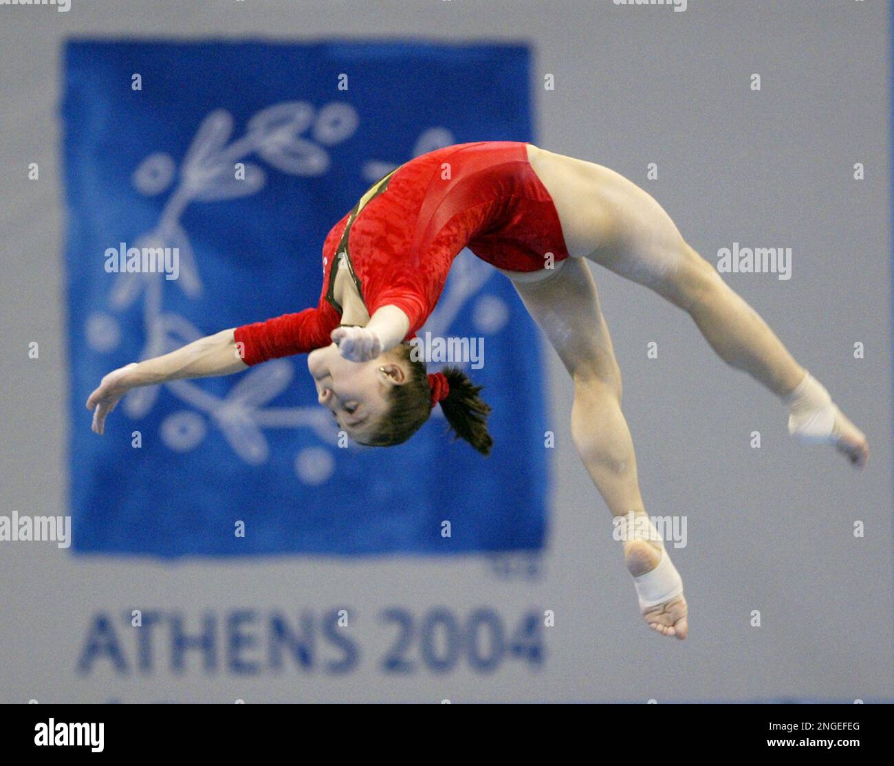Romania's Oana Ban practices her routine on the balance beam during a ...