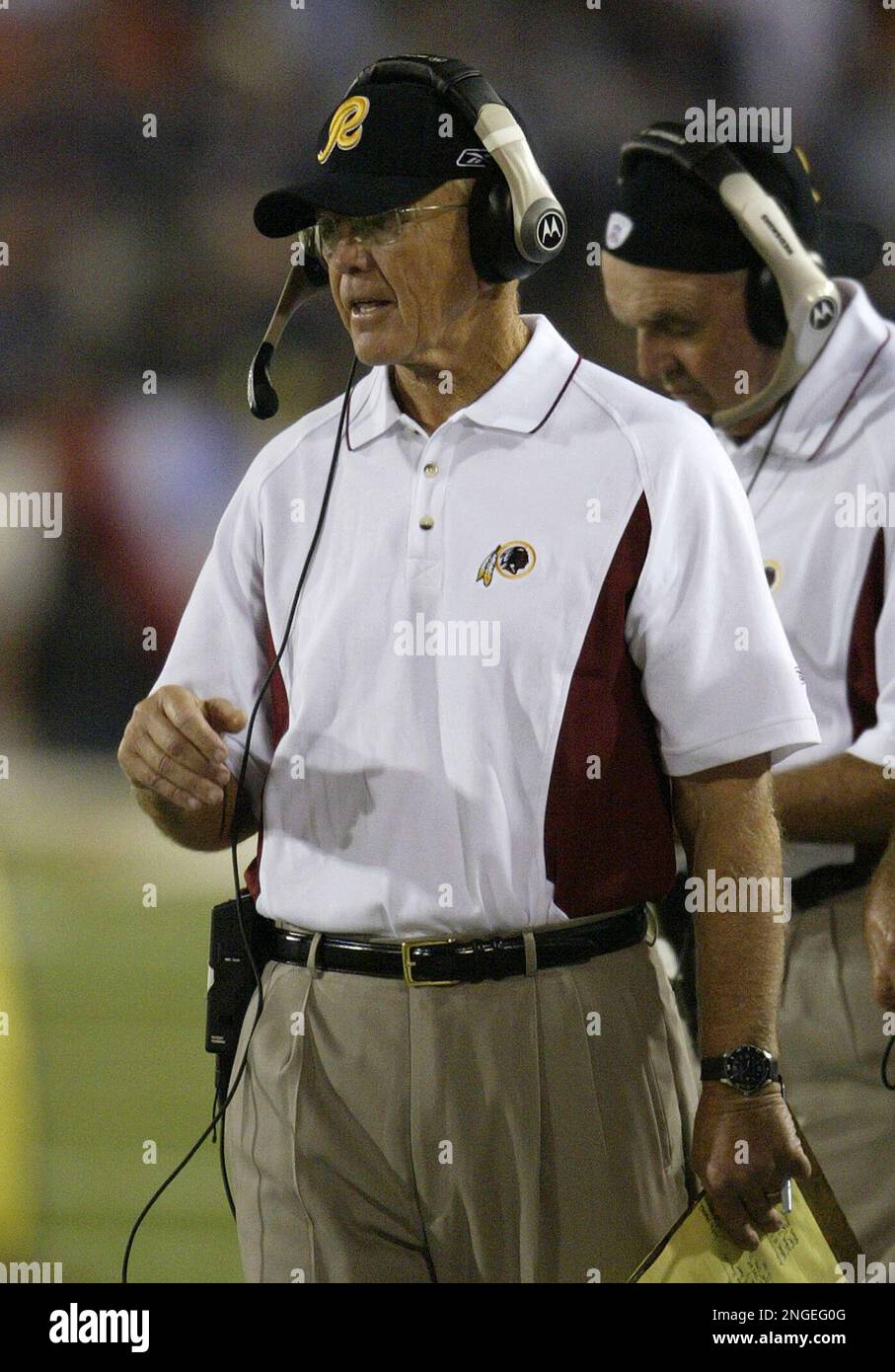 Washington Redskins head coach Joe Gibbs directs his team in the second ...
