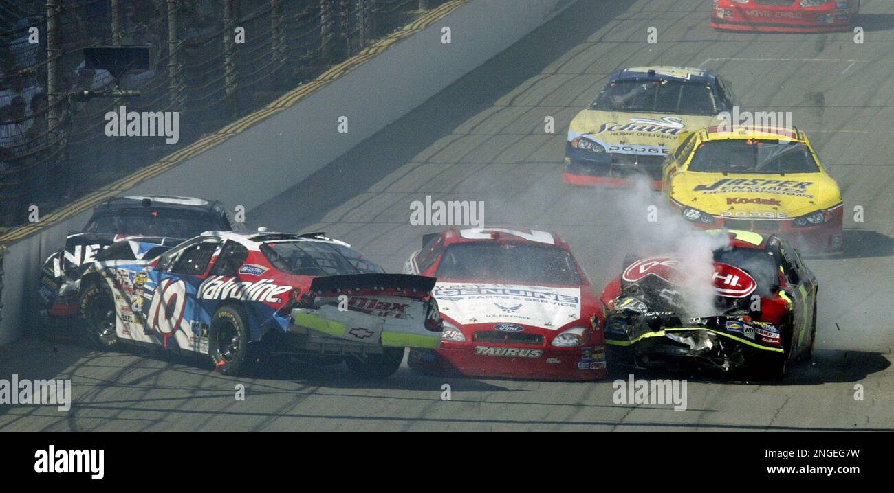 NASCAR drivers Ward Burton, left, Scott Riggs (10), Ricky Rudd and ...