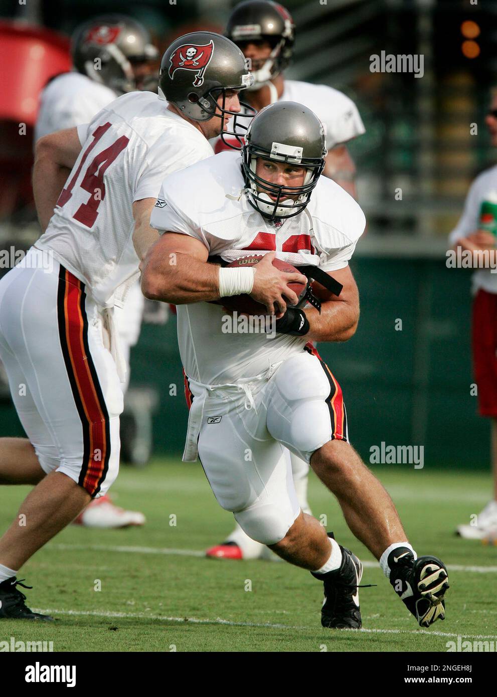 Tampa Bay Buccaneers fullback Mike Alstott heads up field after taking ...