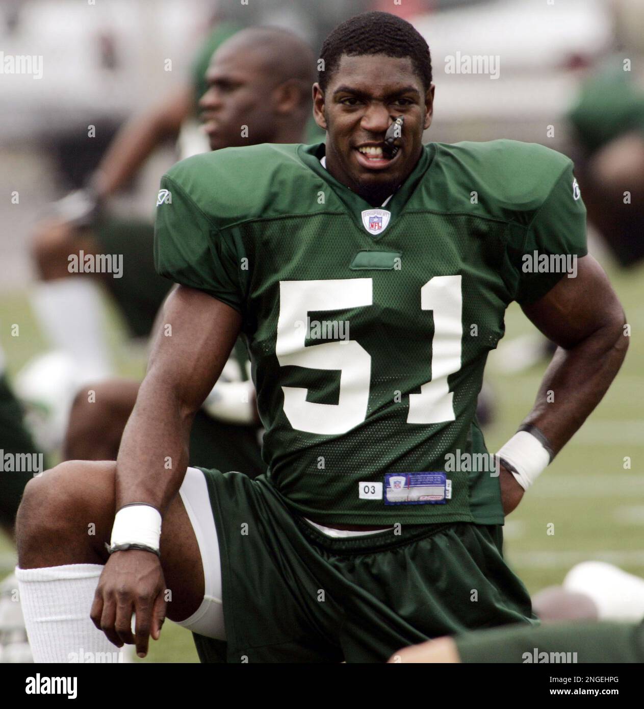 New York Jets first round draft pick Jonathan Vilma stretches during ...