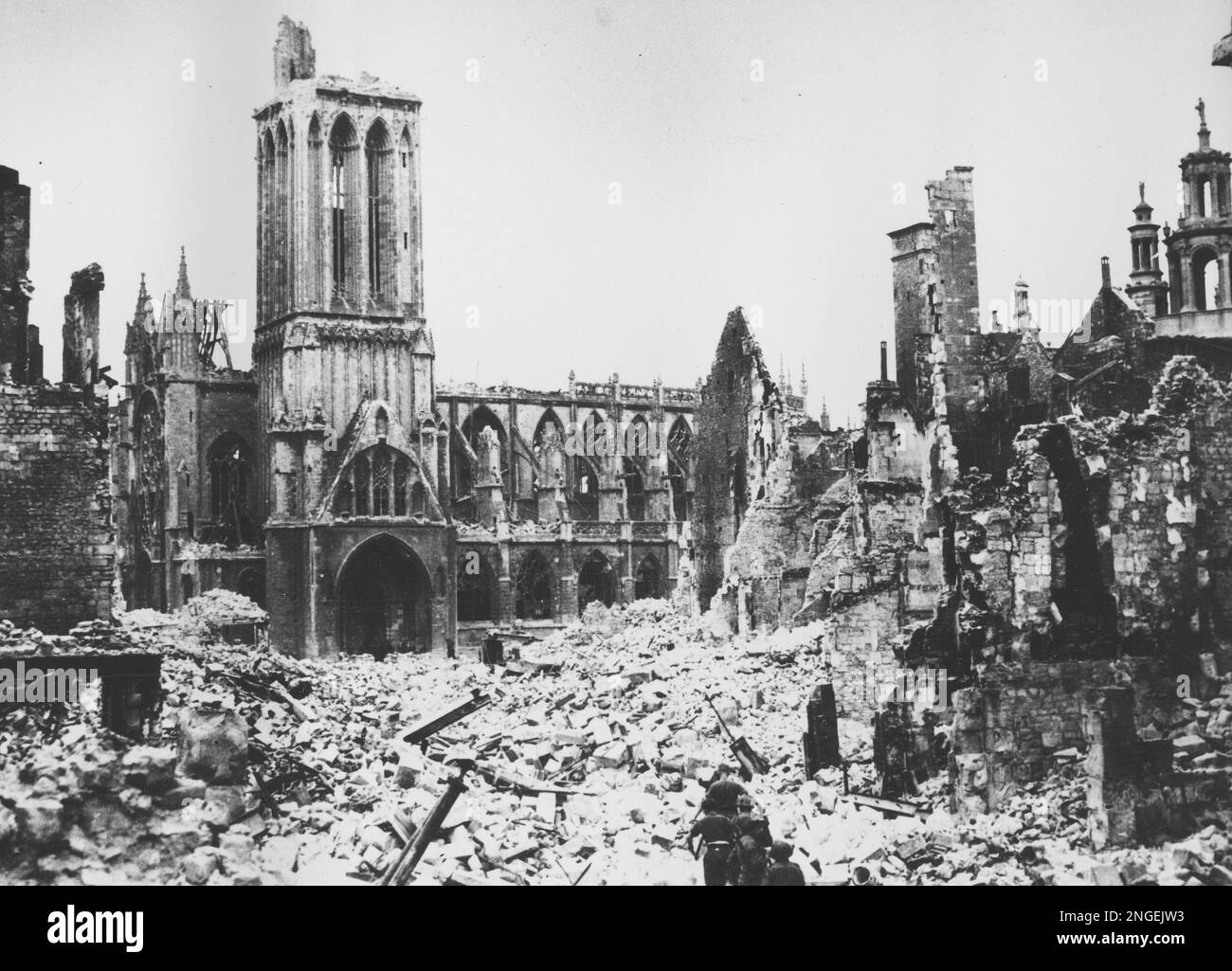 The heavily damaged church of St.Pierre stands amid rubble and debris ...