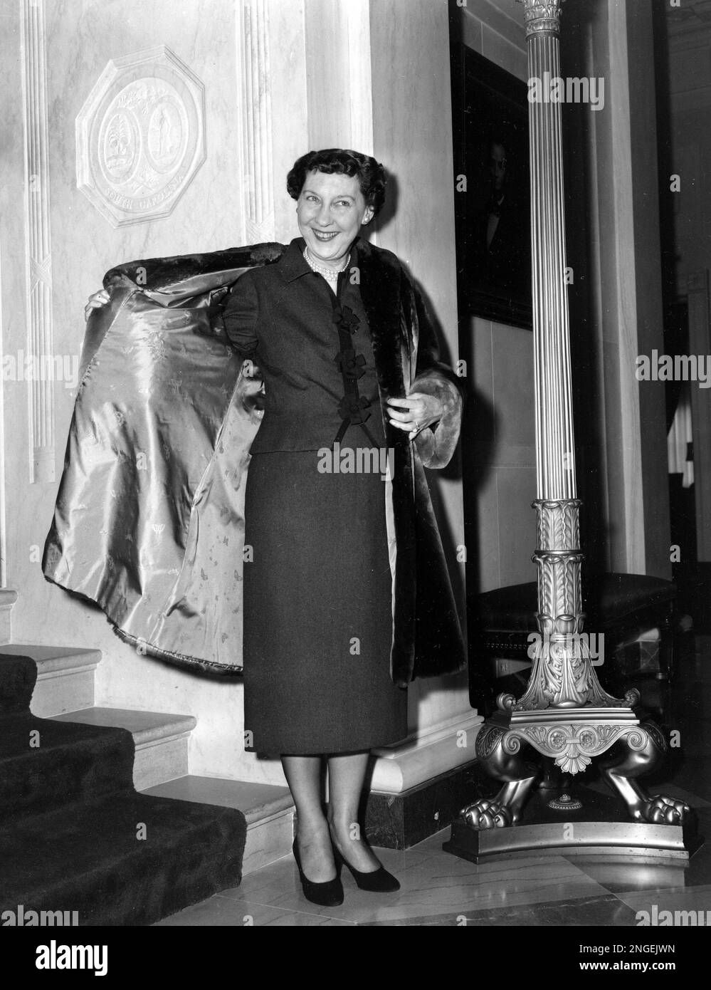 First lady Mamie Eisenhower reacts as any other American woman as she ...