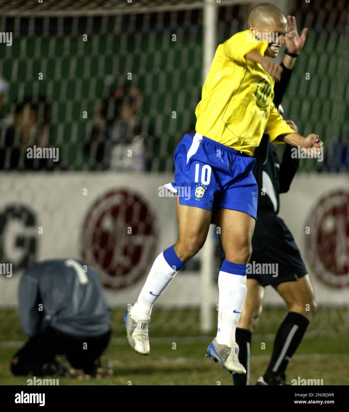 Alex of Brazil, reacts after scoring the winning penalty as Uruguay's ...