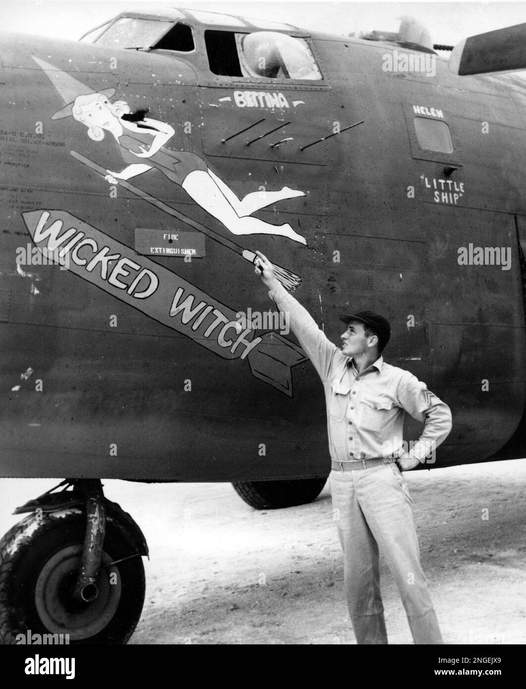 Marine Sgt. William C. Campbell, from Louisville, Ky., points to a hole ...