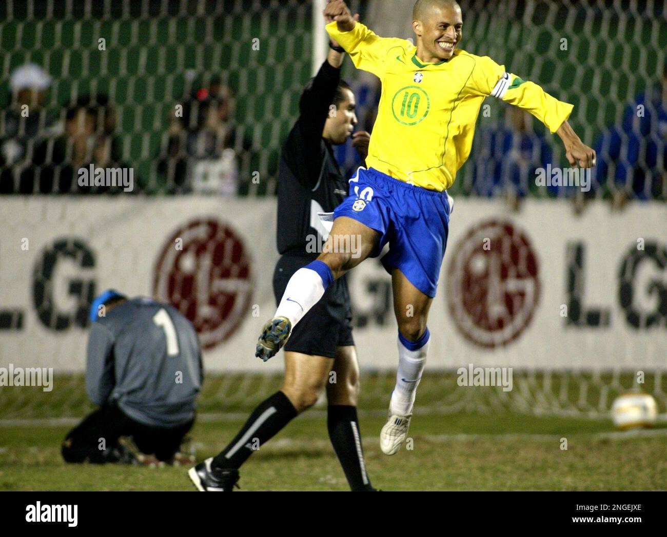 Alex of Brazil, reacts after scoring the winning penalty shot as ...