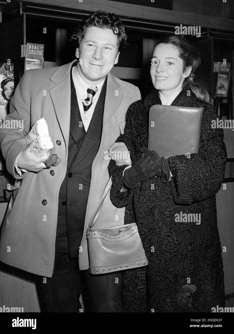 British actor Peter Ustinov and his wife French actress Suzanne Cloutier, arrive at London ...