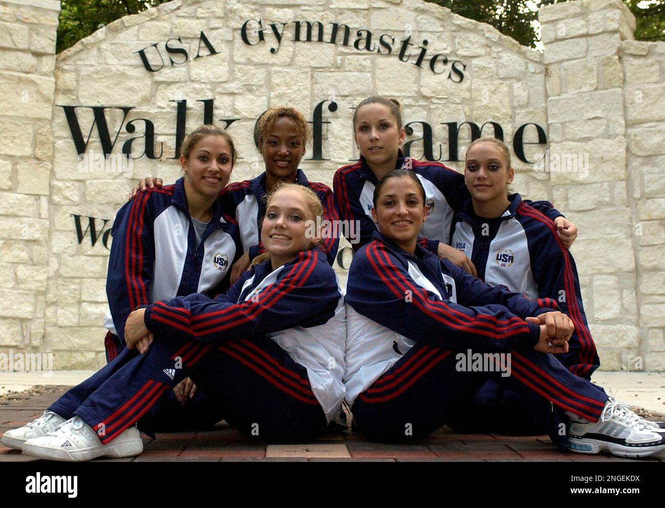 The U.S. women's Olympic gymnastics team poses Sunday, July 18, 2004 ...