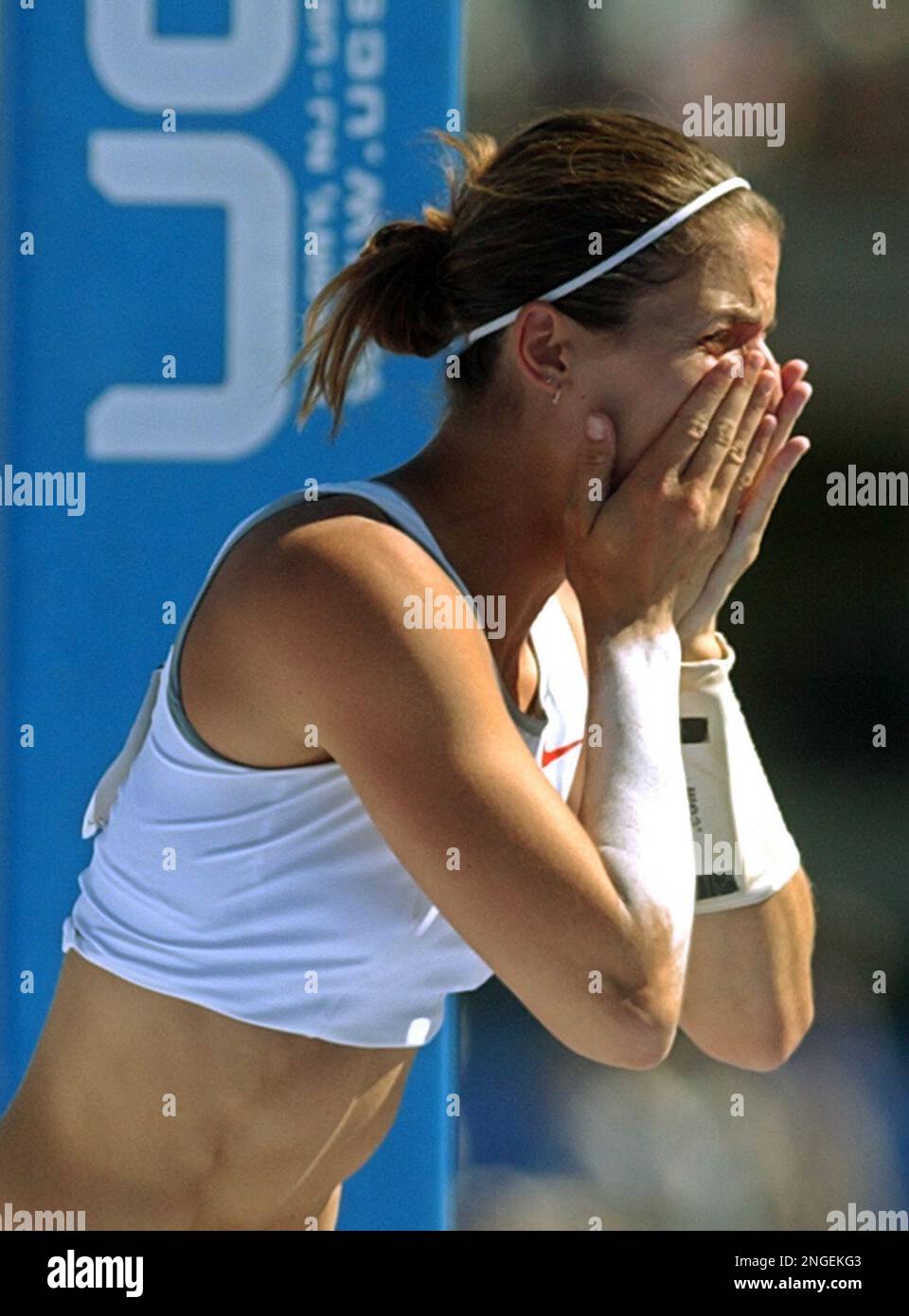 Kellie Suttle reacts after a successful vault in the pole vault final ...