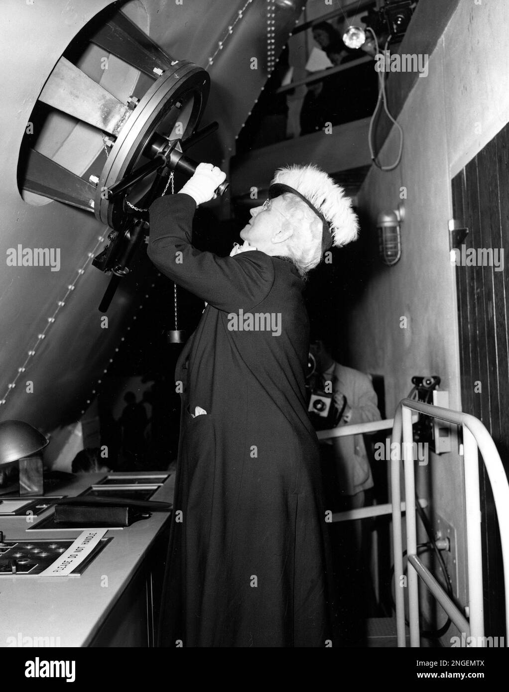 During a dedication ceremony Evelina Hale looks through an eyepiece on ...
