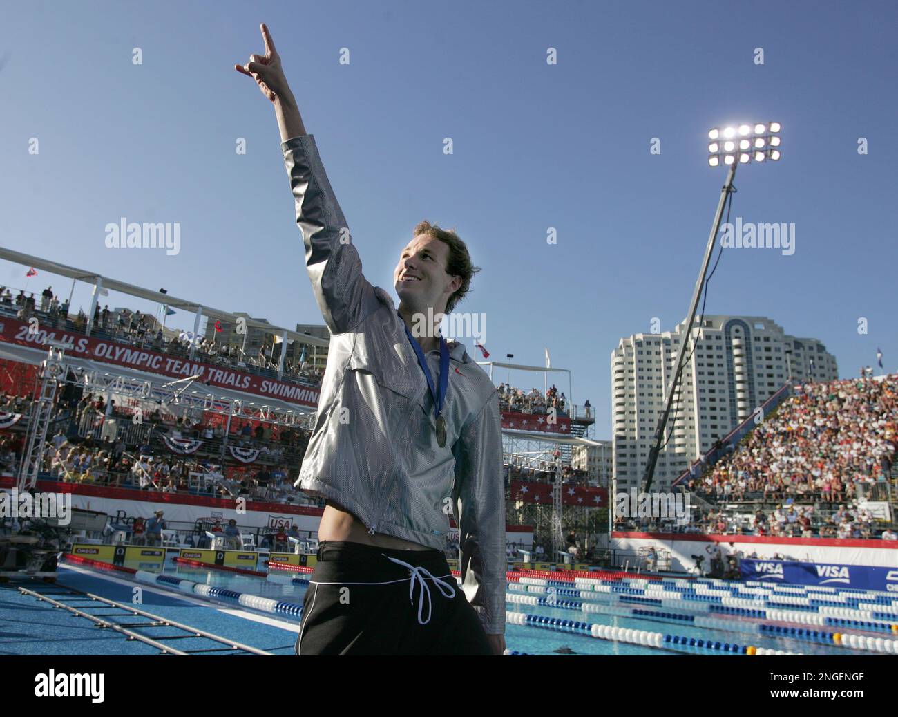 Swimmer Aaron Peirsol, left, celebrates his world record finish in the ...