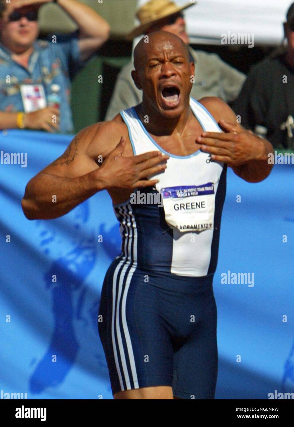 Maurice Greene reacts after finishing first in the men's 100 meter ...