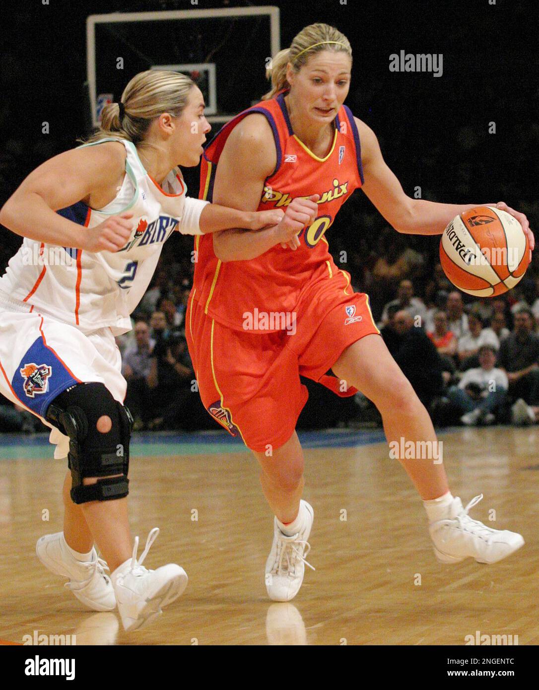 Phoenix Mercury's Anna DeForge drives past New York Liberty's Becky ...