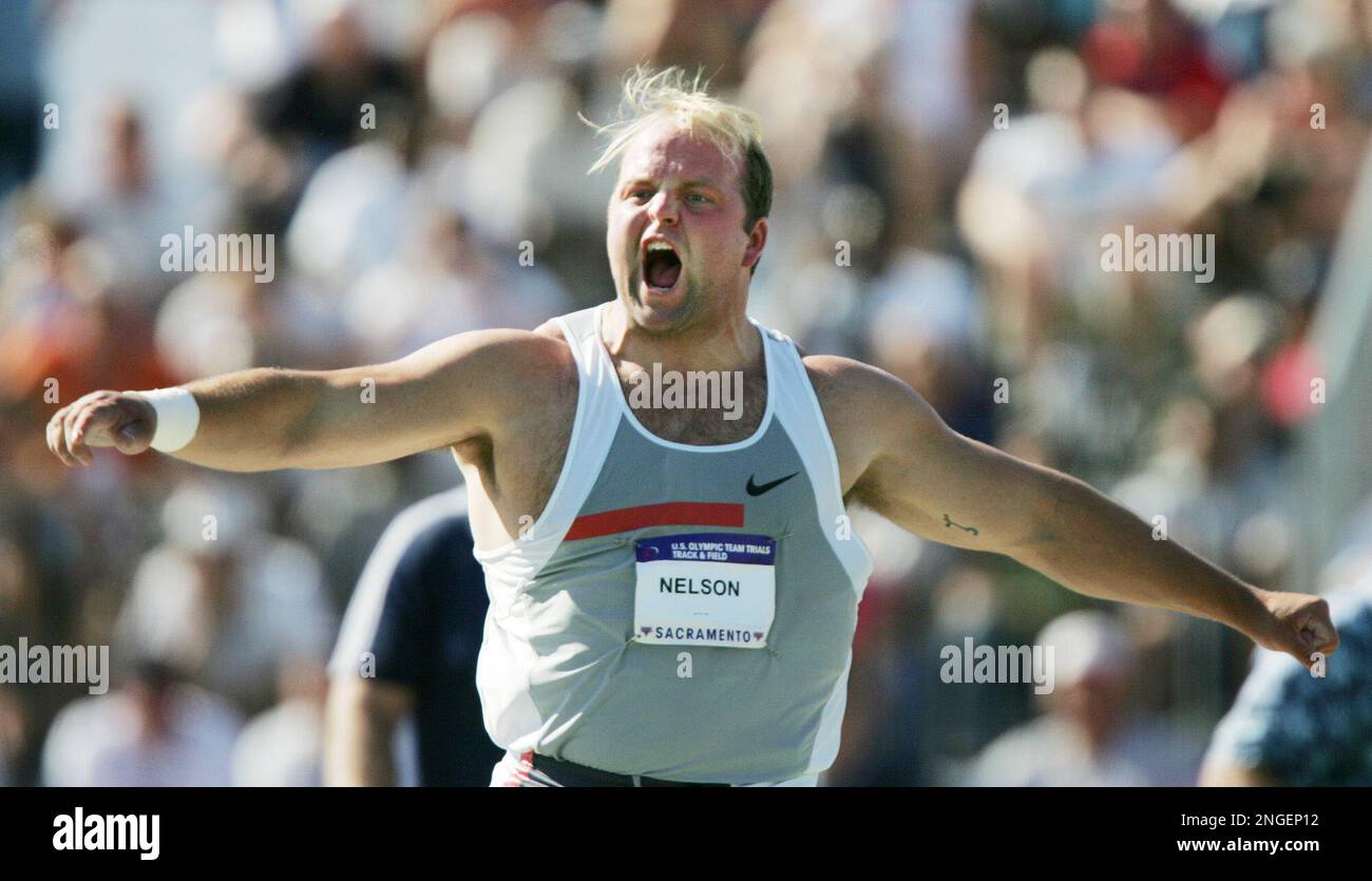Adam Nelson of Athens, Ga. reacts after a throw in the men's shot put ...