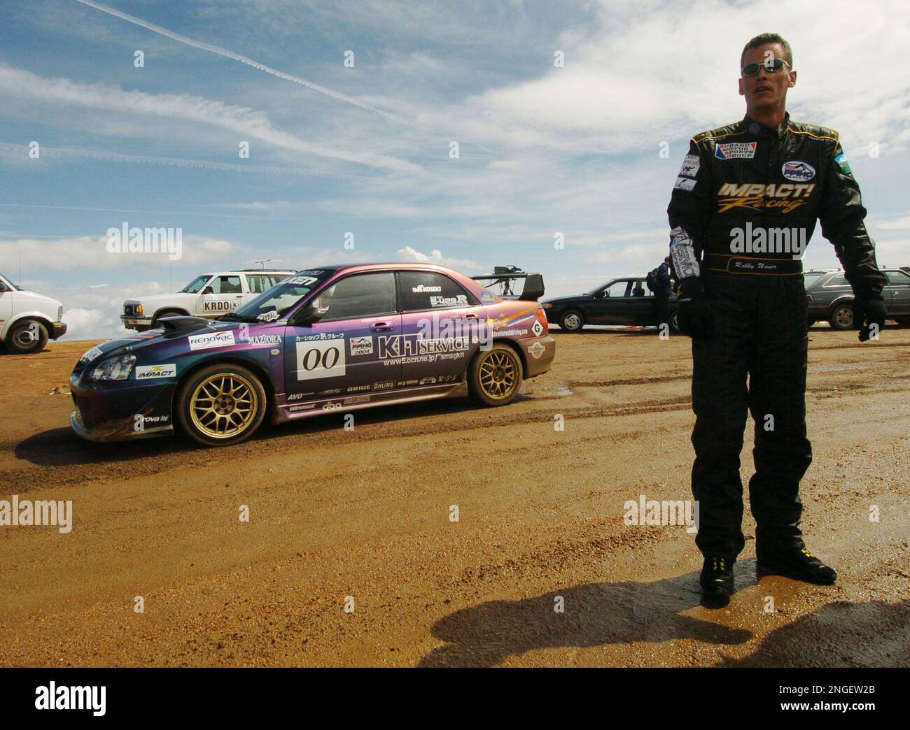 Robby Unser of Albuquerque, N.M., walks away from his Subaru WRX after ...