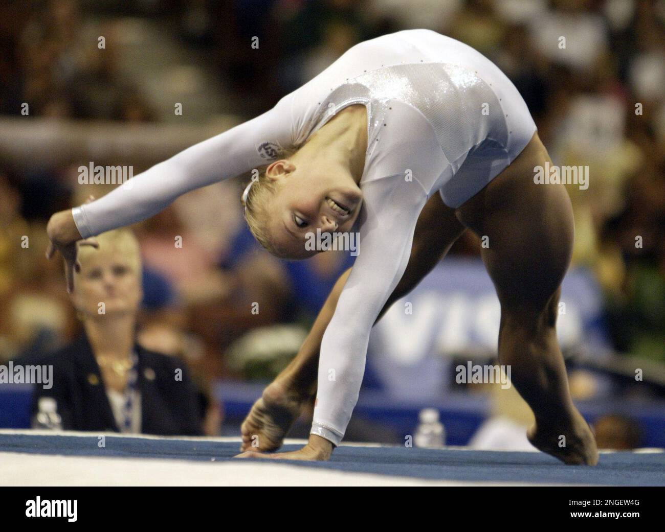 Courtney McCool competes in the floor exercise during the women's final ...
