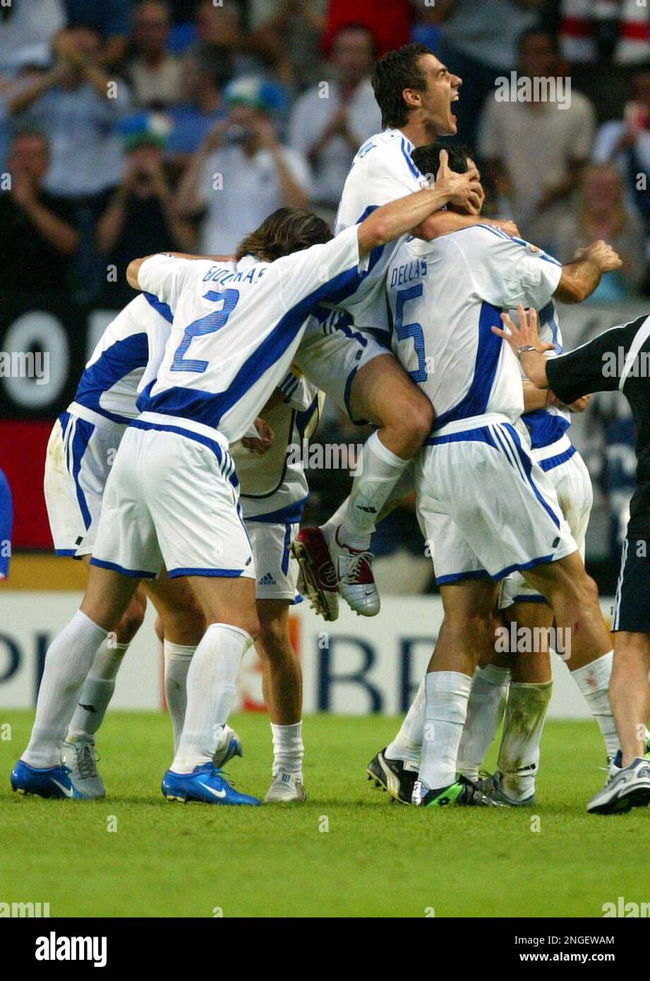 Greece players celebrate after Angelos Charisteas scored the only goal ...