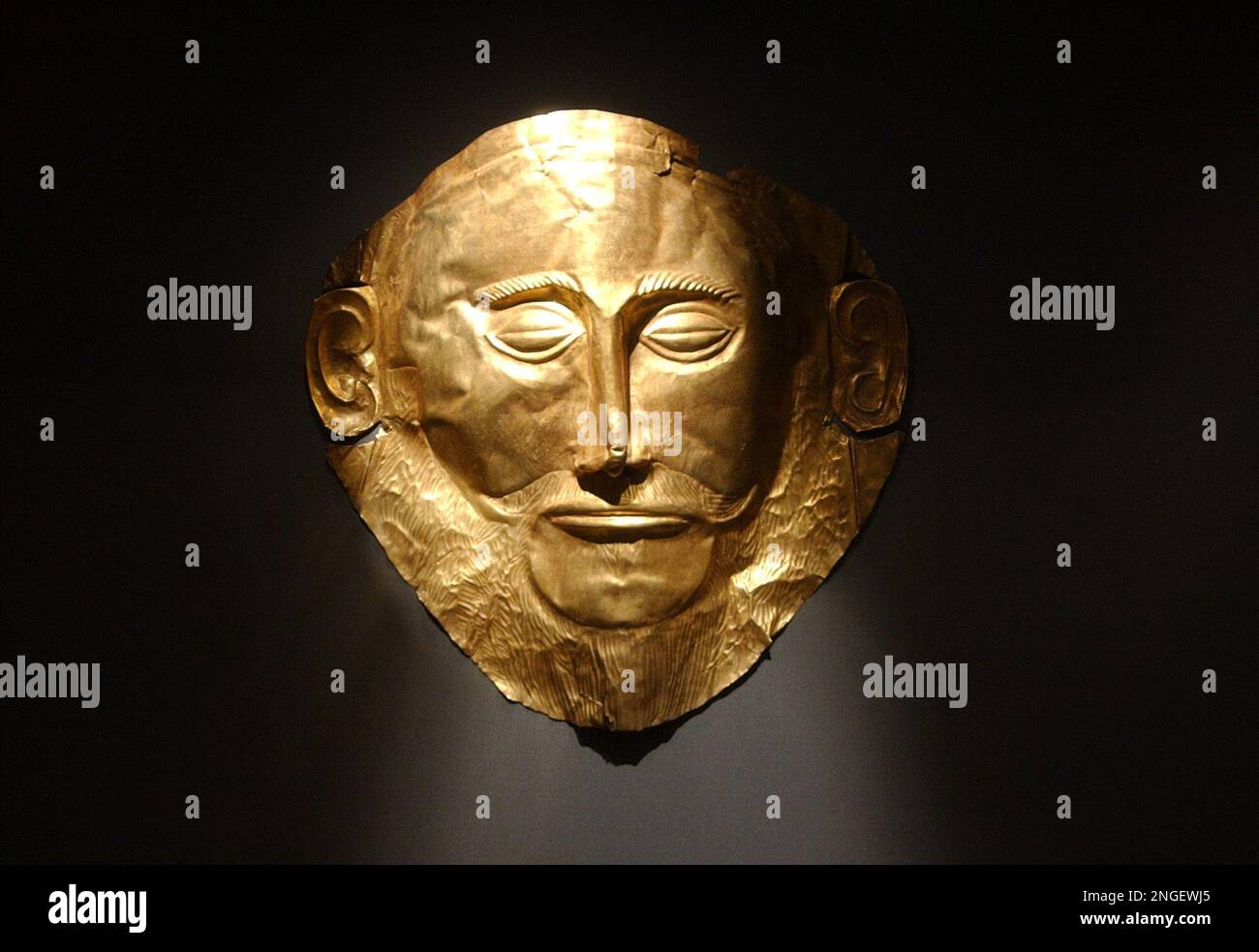 A gold death-mask, known as the mask of Agamemnon, is on display at ...