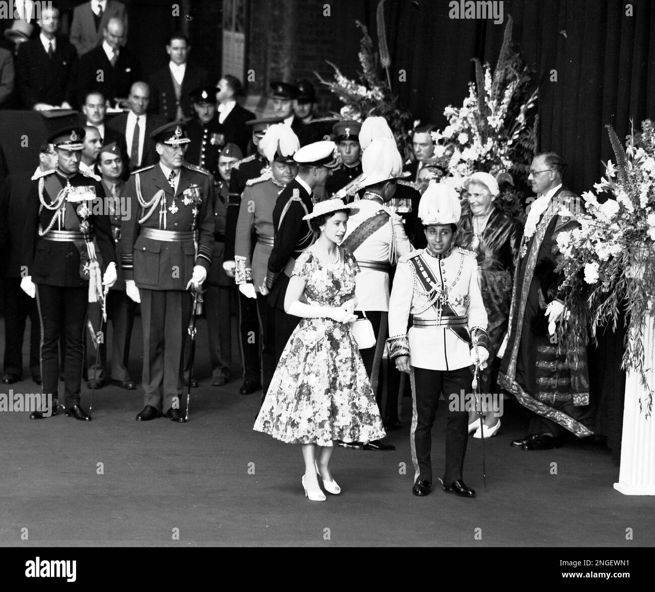 King Faisal II of Iraq is met by Britain's Queen Elizabeth II on his ...