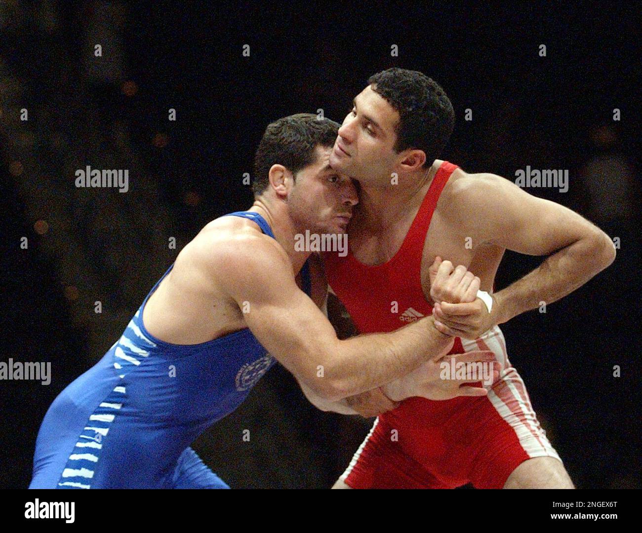 Ahmed Weali, of Iraq, right, wrestles Spain's Alberto Recuero during ...