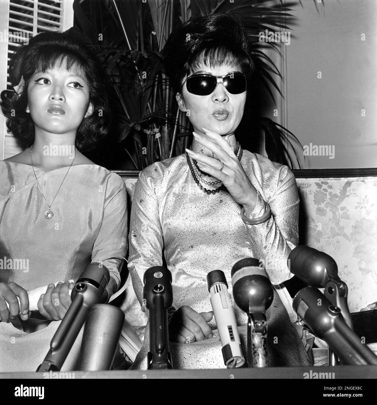 Mrs. Ngo Dinh Nhu, right, speaks at a news conference in Beverly Hills ...