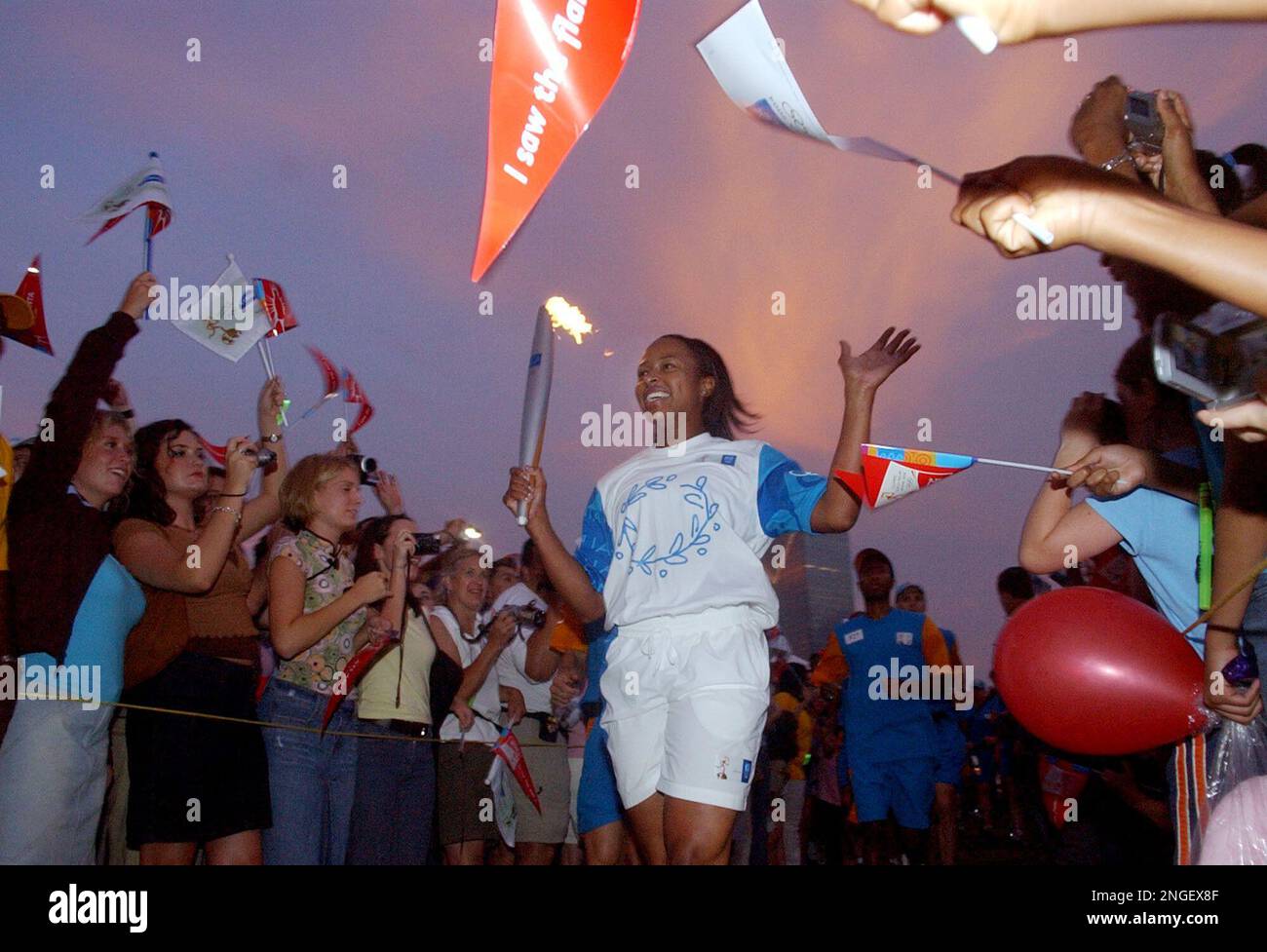 Olympic bobsled gold medalist Vonetta Flowers of Atlanta runs through a ...