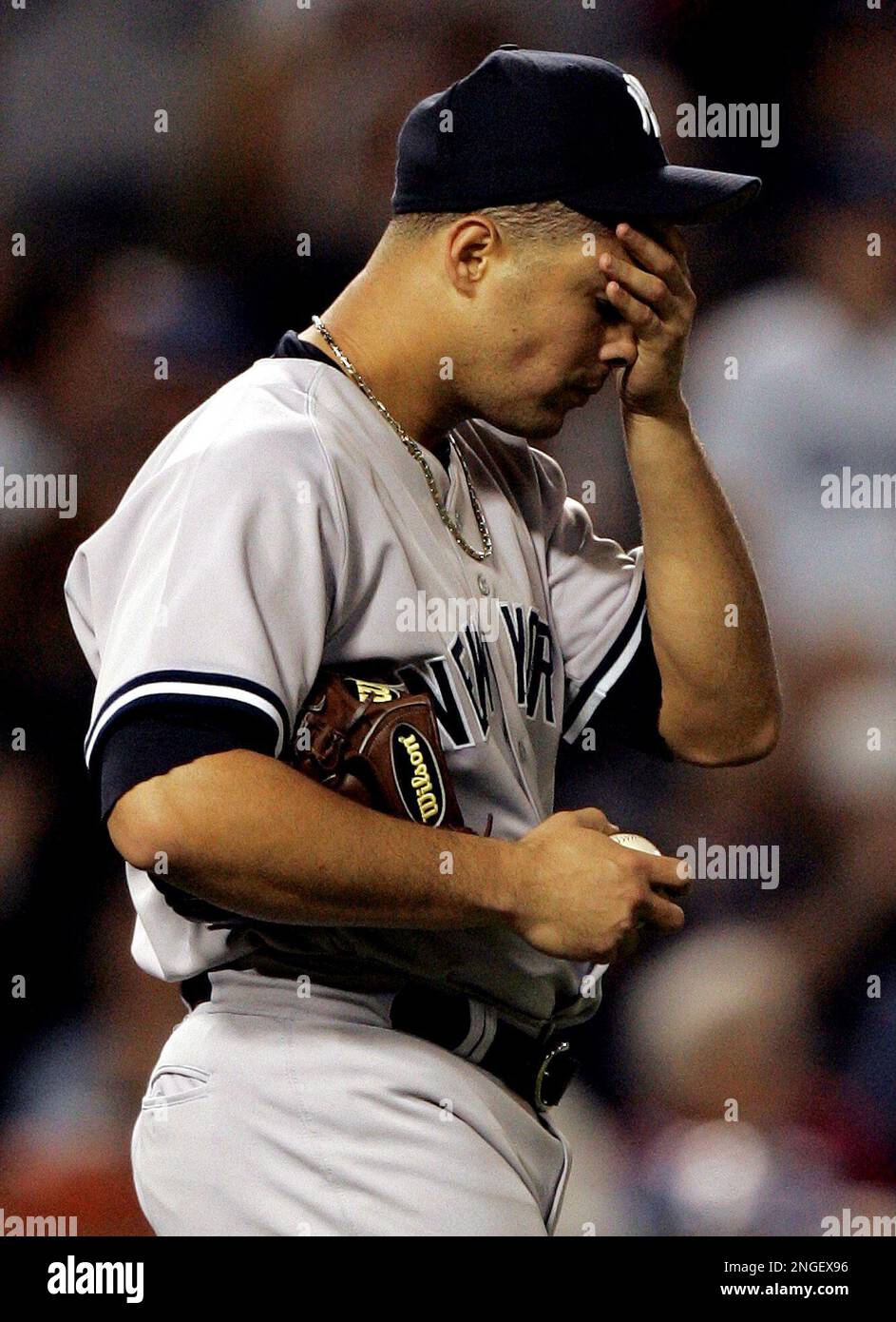 New York Yankees pitcher Javier Vazquez reacts after allowing Los ...
