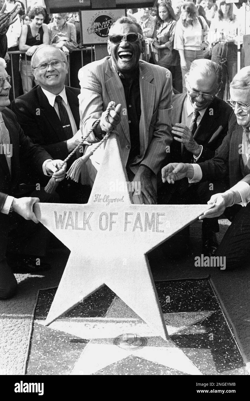Recording star Ray Charles, center, is delighted with his star in the ...