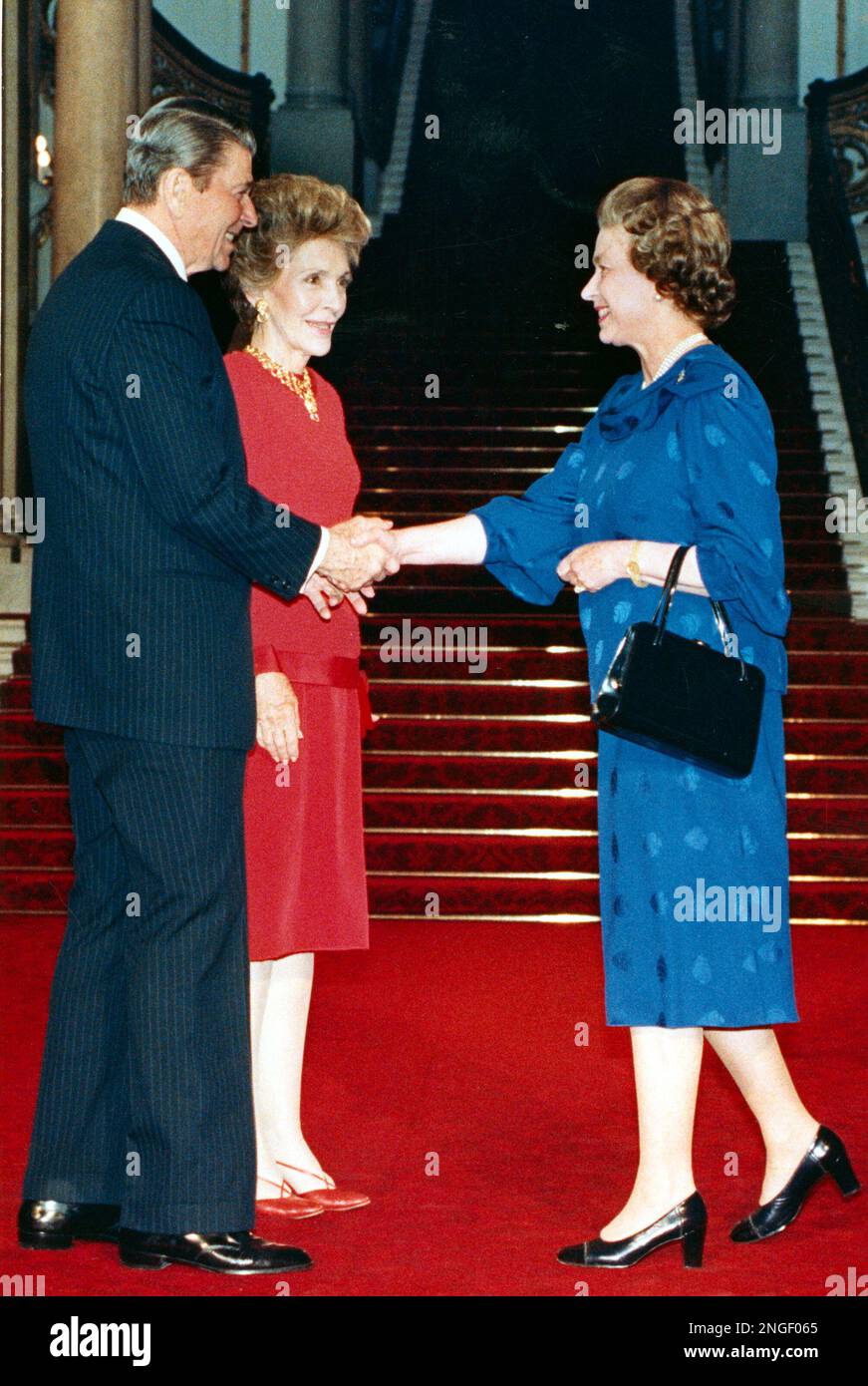 Britain's Queen Elizabeth II, right, welcomes U.S. President Ronald ...