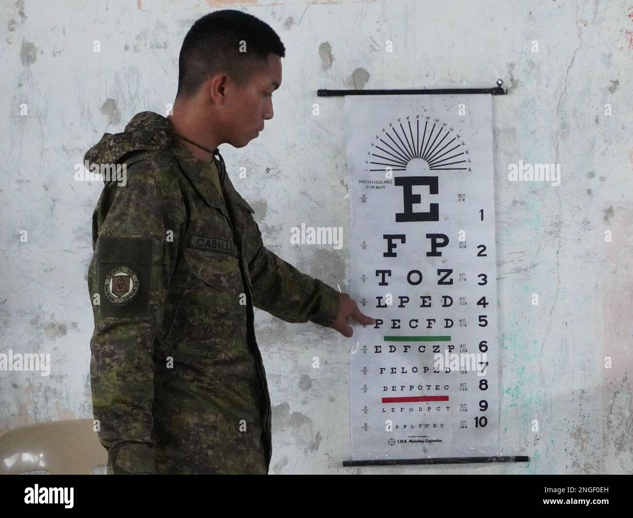 Palapag, Philippines. 18th February, 2023. Soldiers assisting patients ...