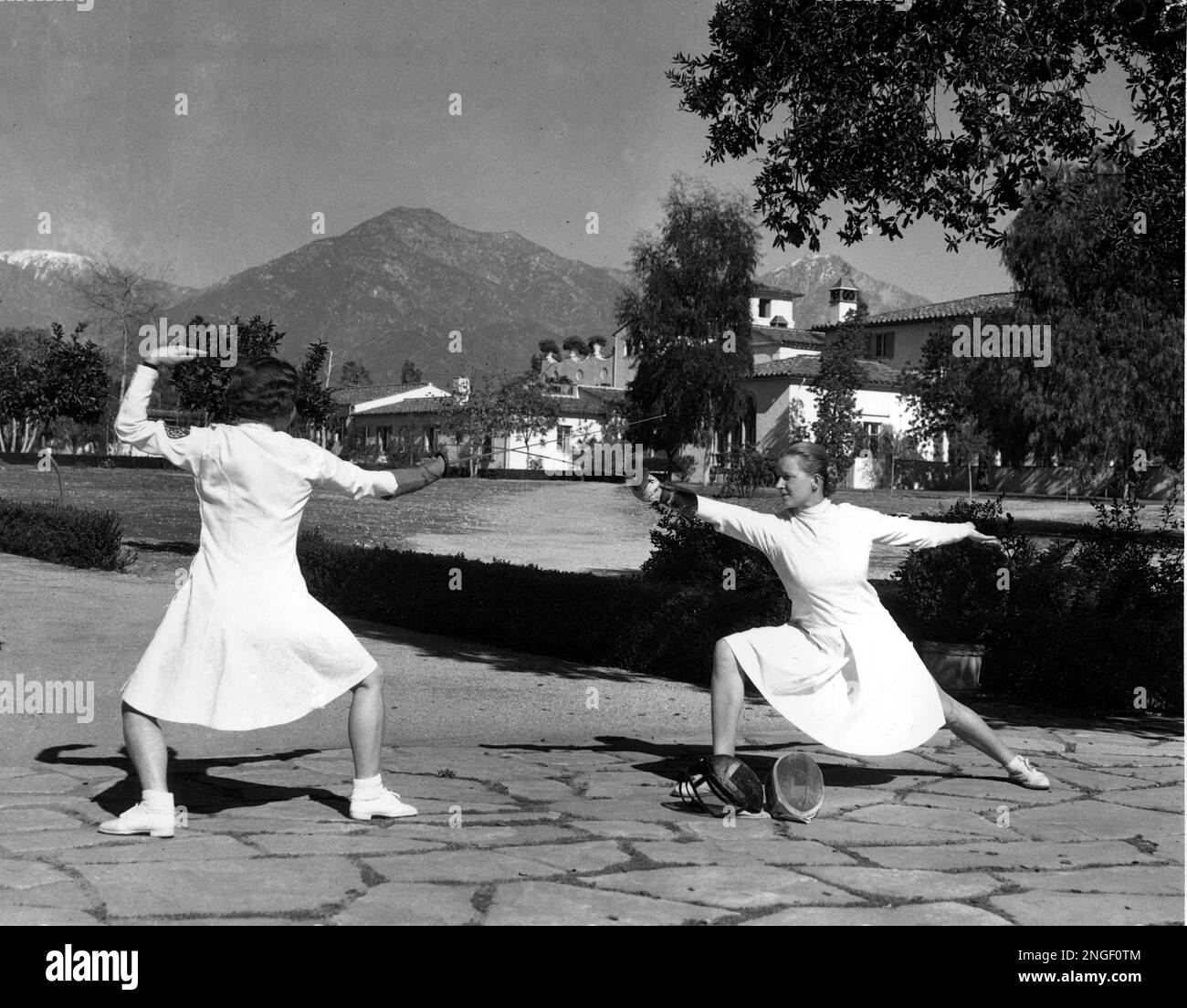 Fencing champion Helene Mayer, right, of Germany, practices with Mrs ...