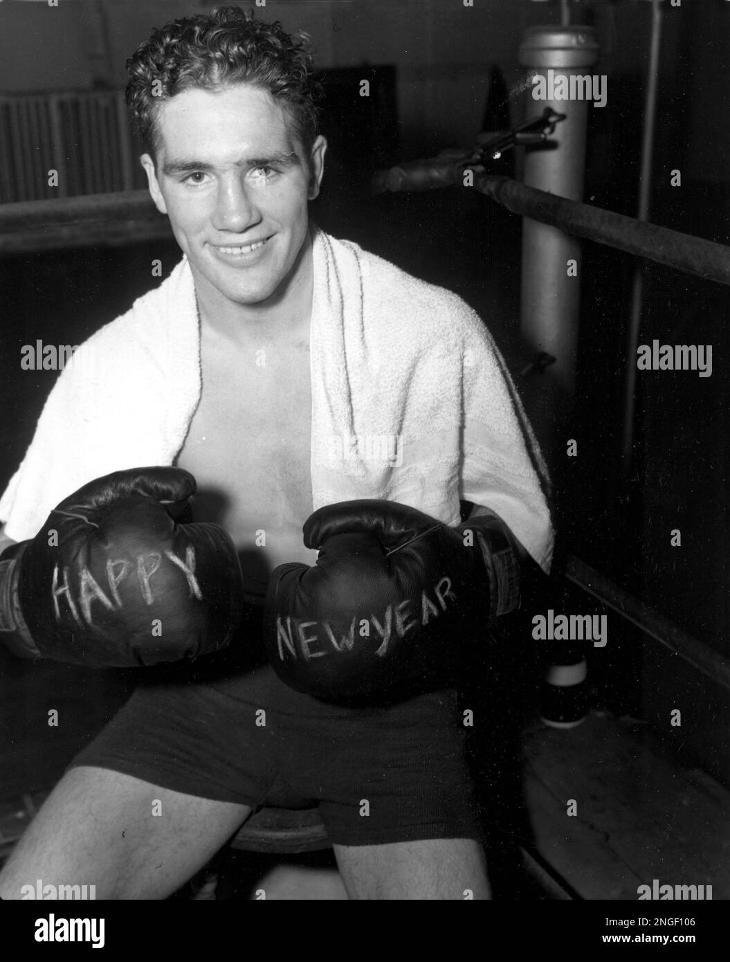 Middleweight boxer Billy Conn of Pittsburgh, Pa., has a Happy New Year ...
