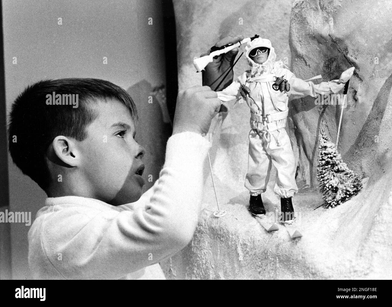 Christopher Rogers, 7, plays with a G.I. Joe doll at a toy store in New ...
