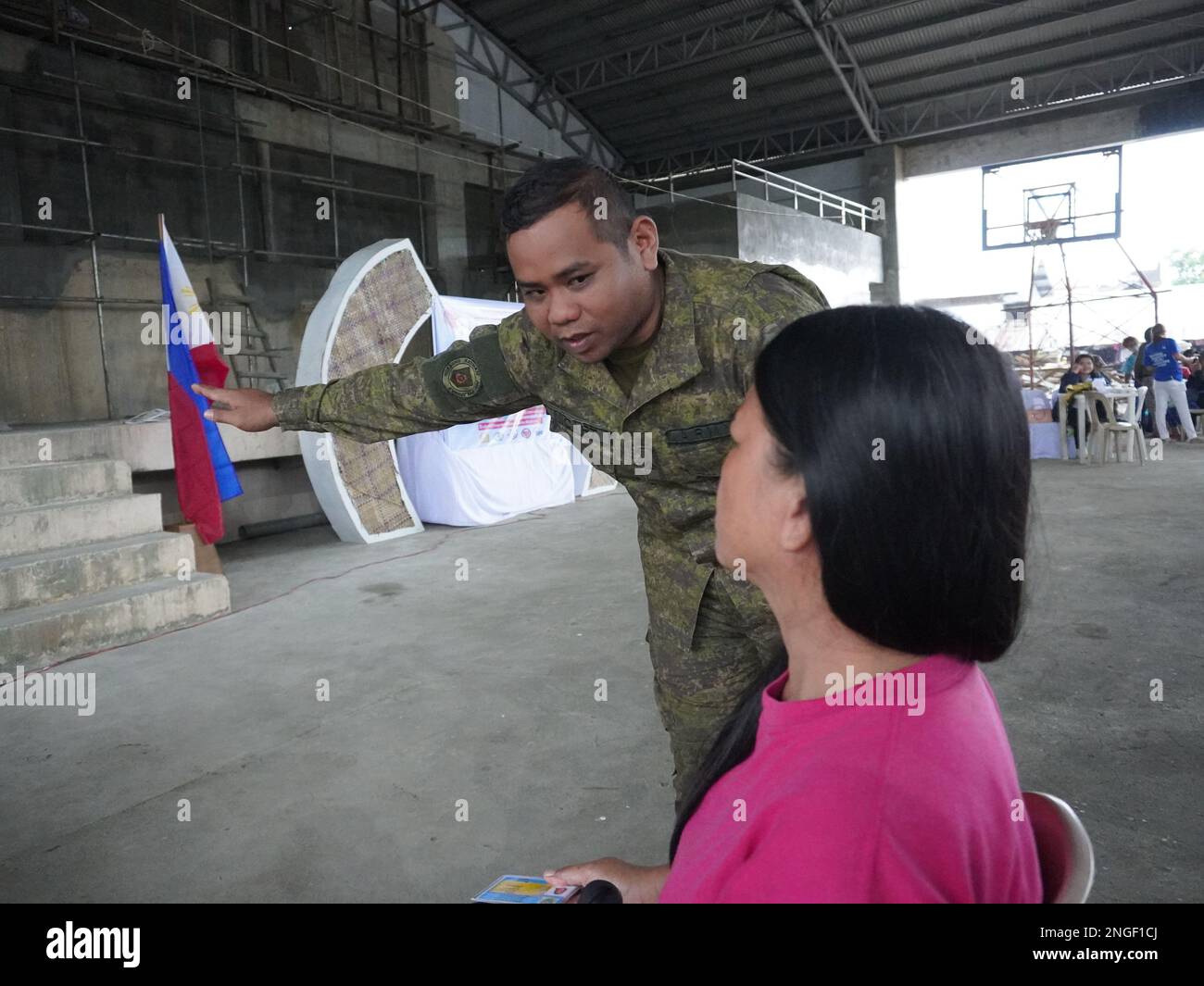 Palapag, Philippines. 18th February, 2023. Soldiers assisting patients ...
