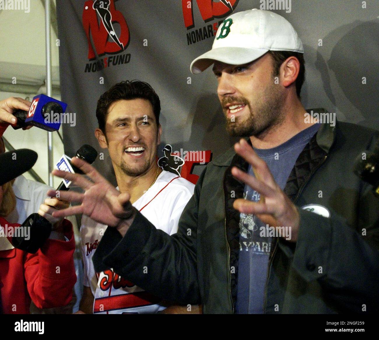 Boston Red Sox star Nomar Garciaparra, left, laughs as actor Ben ...