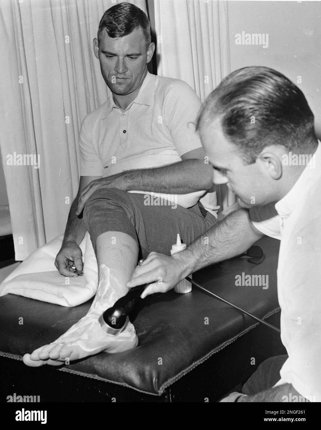 Detroit Tigers pitcher Denny McLain gets therapy treatment on his foot ...