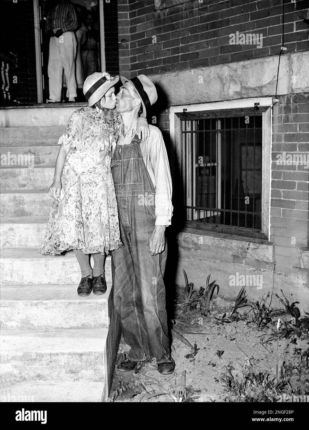 Thirty-two-year-old mountaineer Homer Peel kisses his bride Geneva on ...