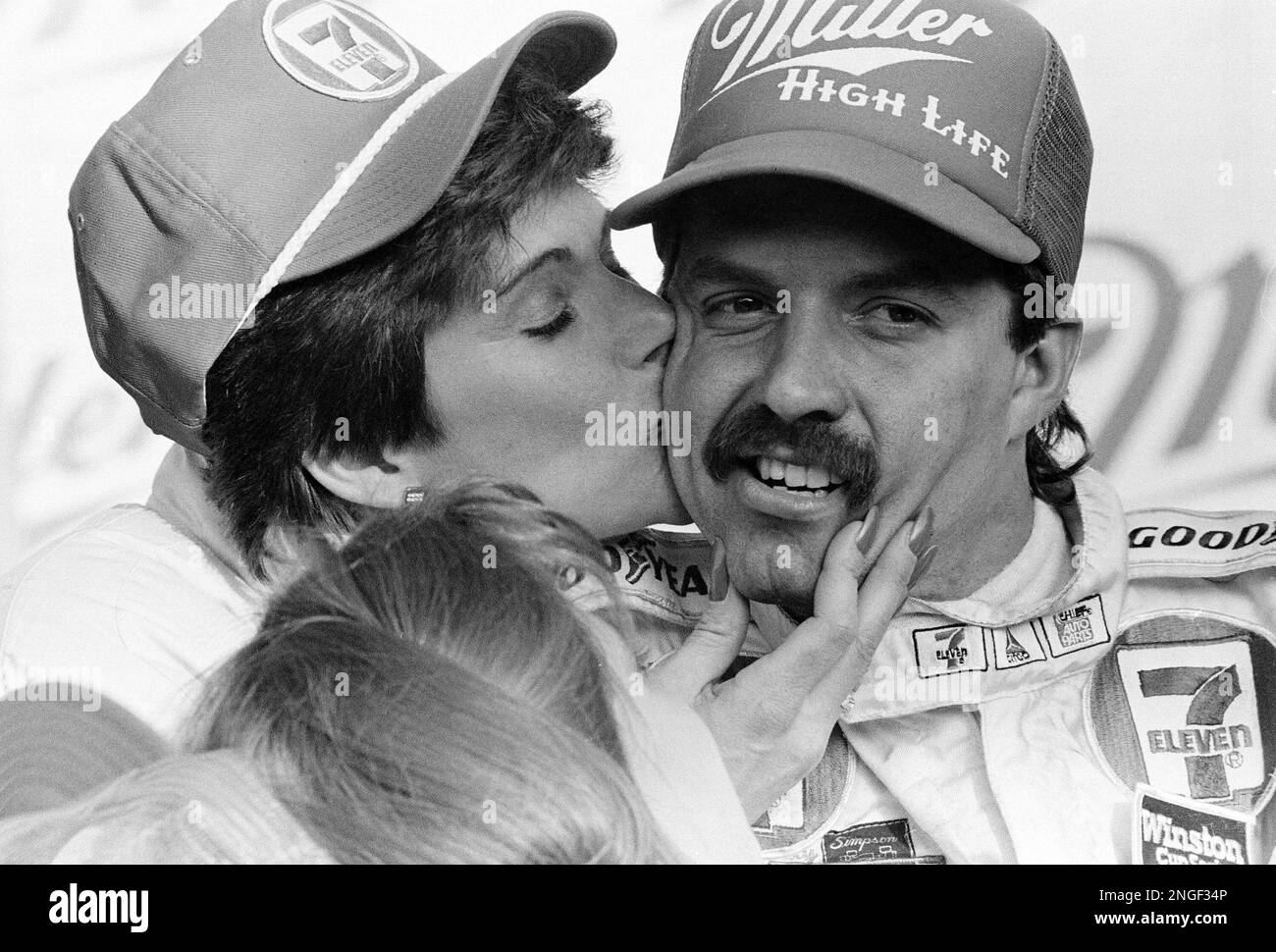 The winner of the Miller High Life 400 stock car race Kyle Petty gets a ...