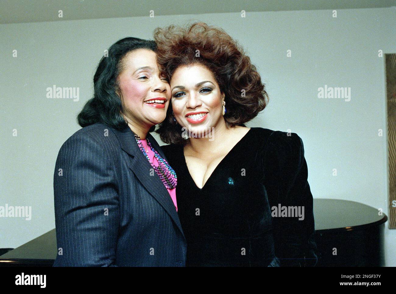 Coretta Scott King, left, hugs opera star Leona Mitchell at the ...