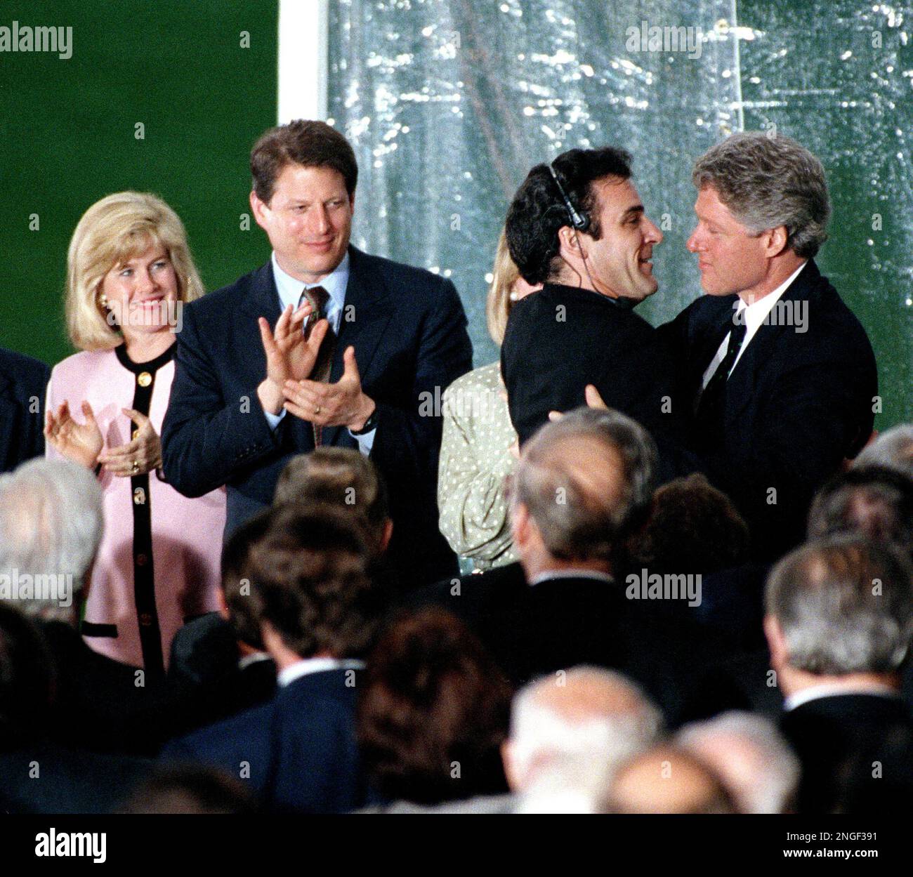 U.S. President Bill Clinton, right, hugs Mandy Patinkin after the actor ...