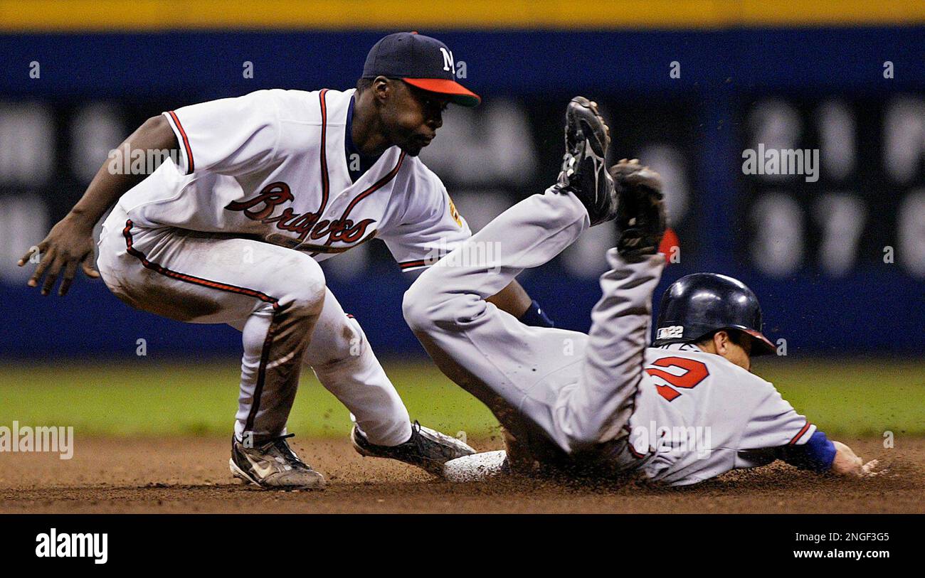 Atlanta Braves' Marcus Giles, right, is tagged out at second by ...