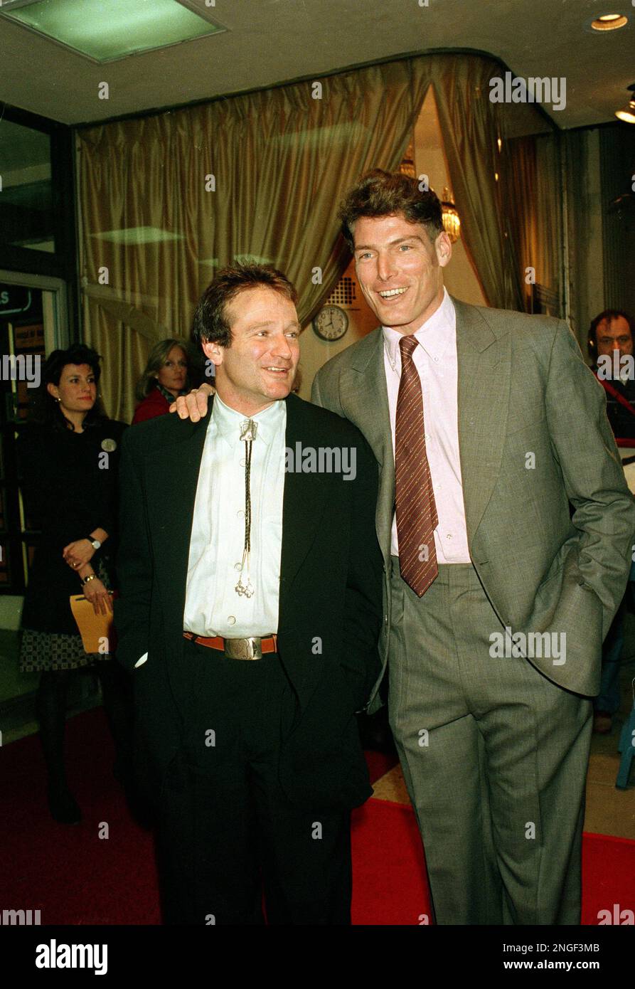 Actor Christopher Reeve, right, poses with colleague Robin Williams as ...